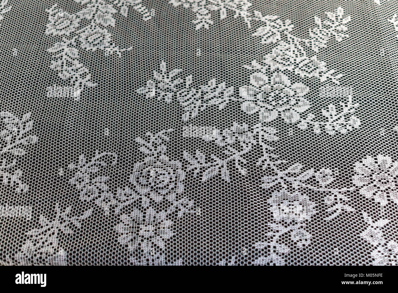 Closed up texture / pattern of a beautiful white crochet tablecloth ...