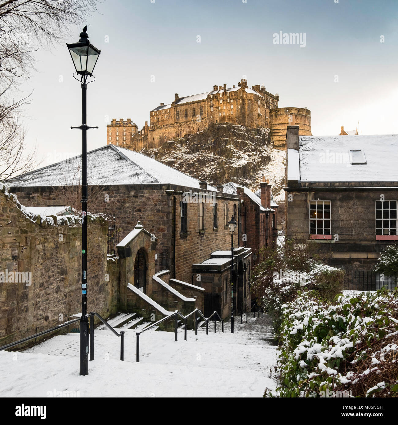 View of Edinburgh Castle after snow from the historic Vennel steps at ...