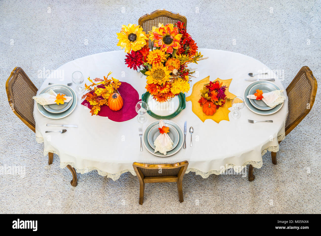 dinning room table setting for four Stock Photo - Alamy
