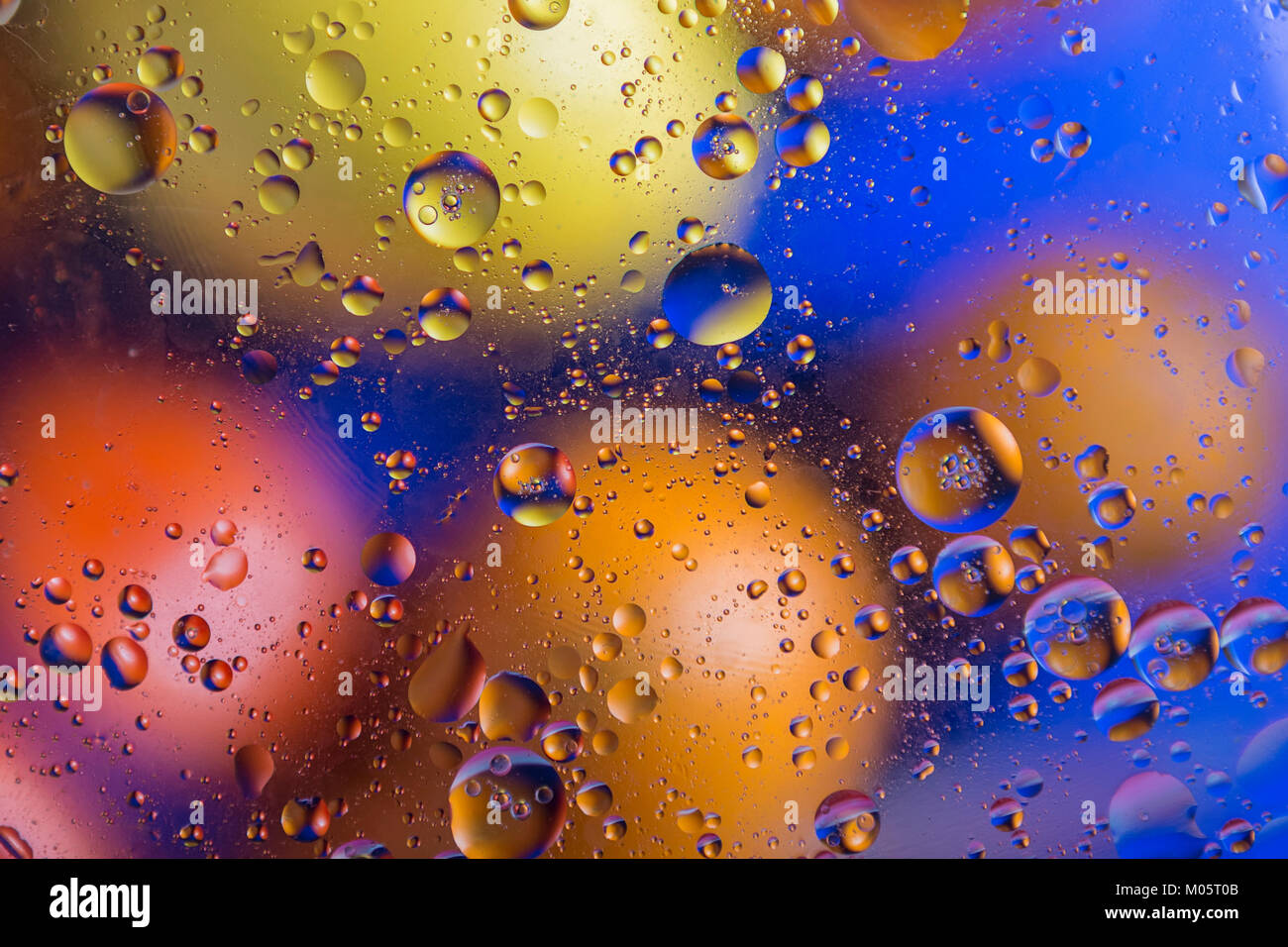 Colorful abstract macro background with oil drops in water Stock Photo ...