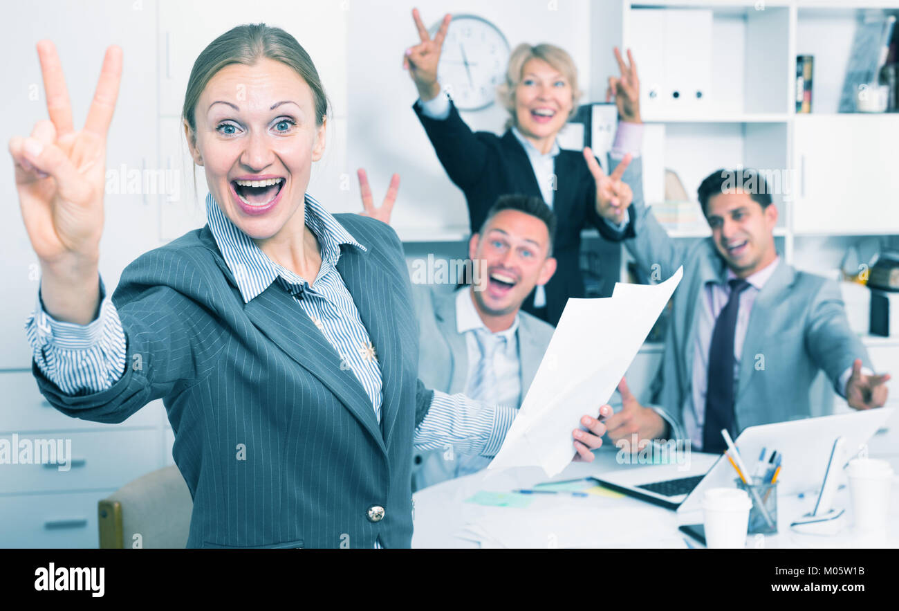 Team emotionally celebrating success hi-res stock photography and ...