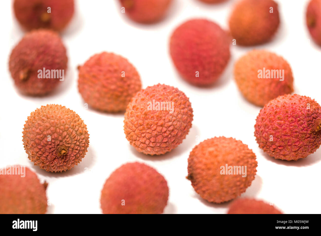 Bunch of Lychee fruits isolated on a white background Stock Photo - Alamy