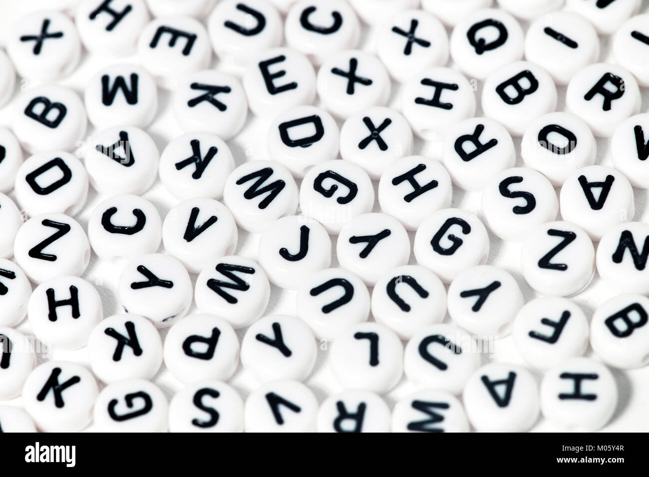 Plastic beads with letters isolated on a white background Stock Photo ...