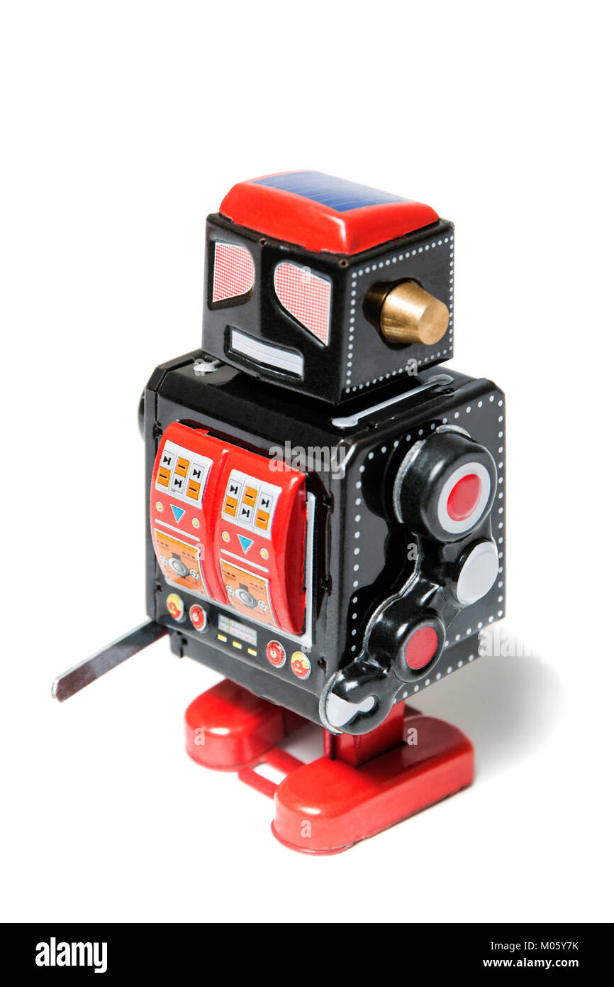 Vintage tin robot toy isolated on a white background Stock Photo - Alamy