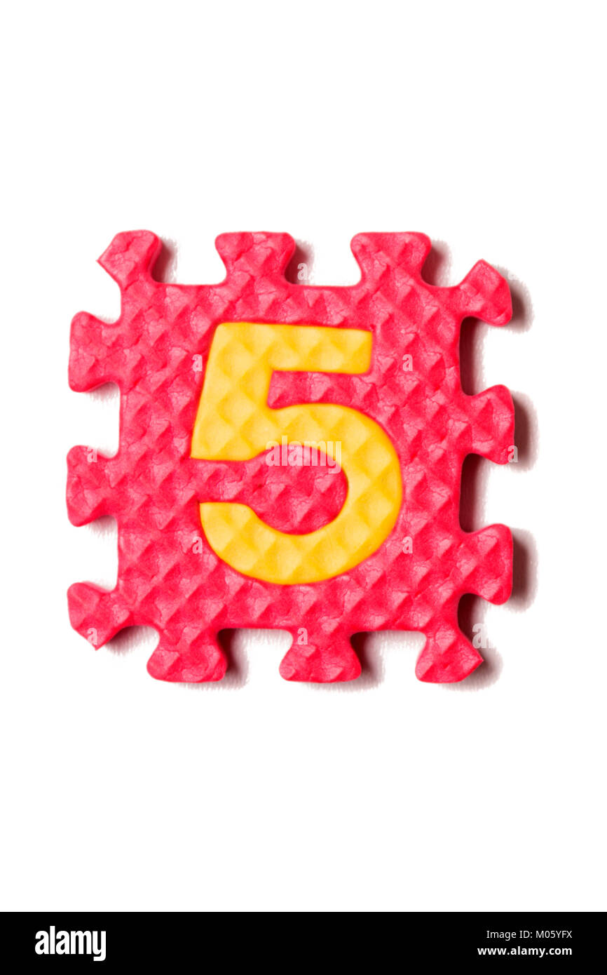 Foam puzzle number isolated on a white background Stock Photo - Alamy