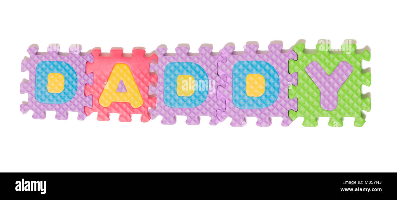 Foam puzzle letter uppercase with word Daddy isolated on a white ...