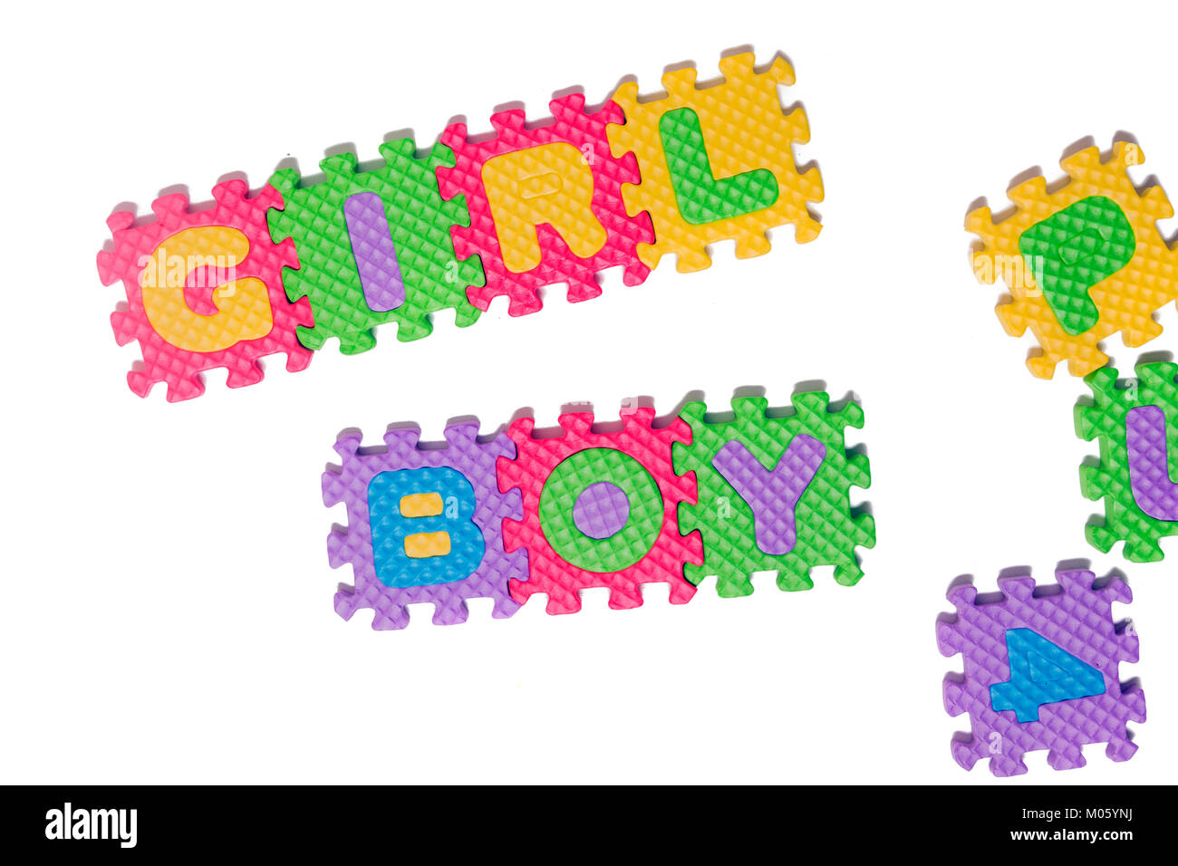 Foam puzzle letter uppercase with word Girl Boy isolated on a white ...
