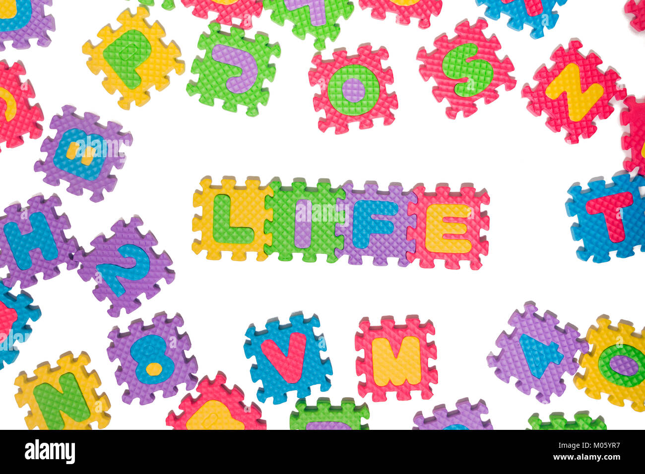 Foam puzzle letter uppercase with word Life isolated on a white ...