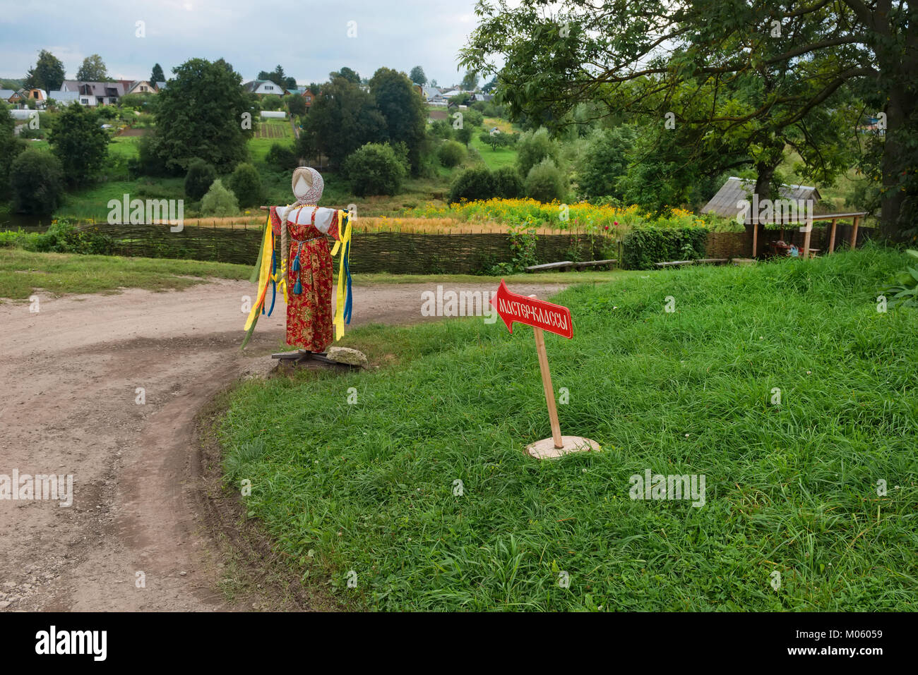Scarecrow in a national costume in the estate of Count Leo Tolstoy in ...