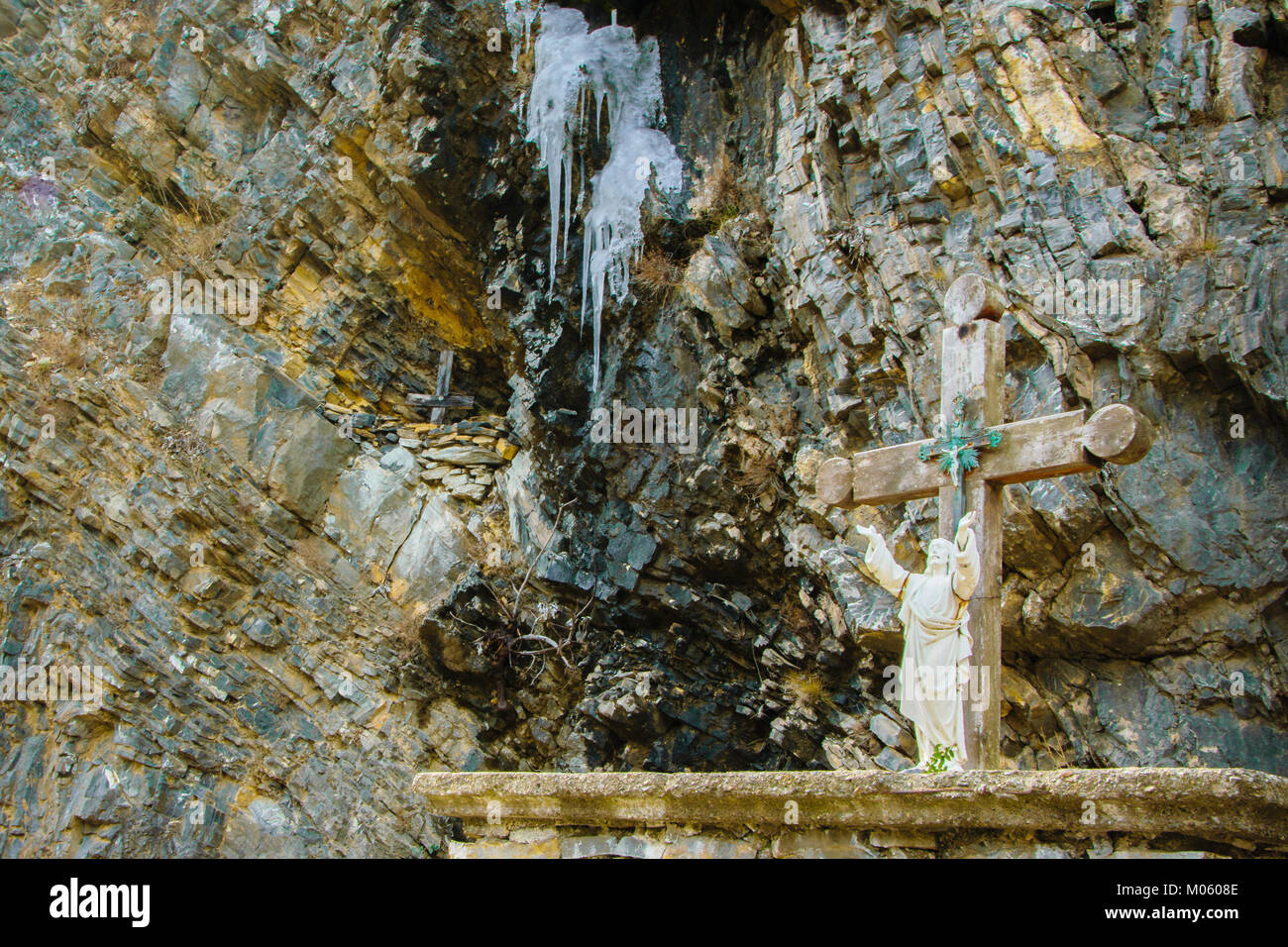 Jesus Christ statue in the rock with hands pointing to the sky Stock ...