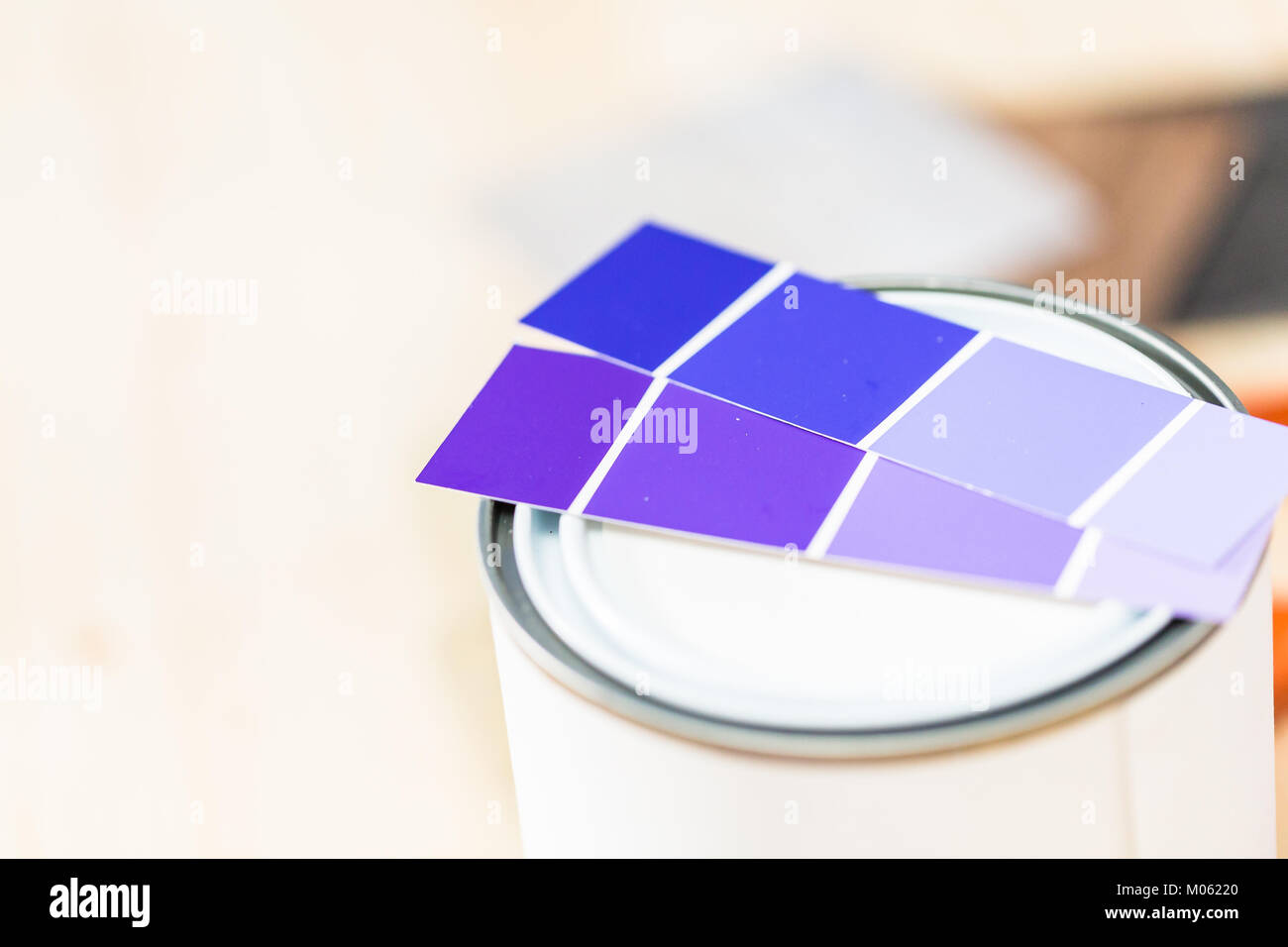 Paint swatches with purple paint sample and metal can with paint Stock ...
