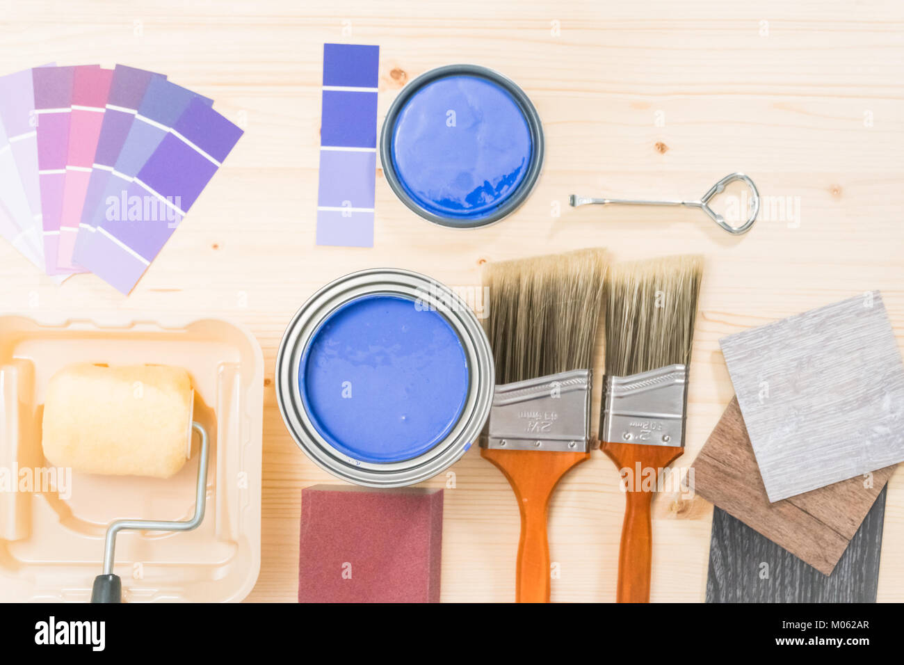 Purple paint and paint brushes for home improvement project Stock Photo ...