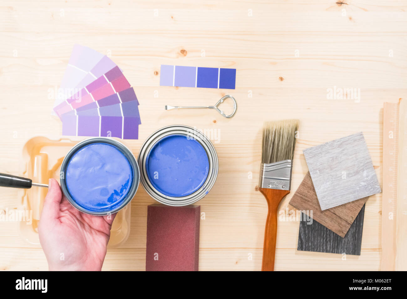 Purple paint and paint brushes for home improvement project Stock Photo ...