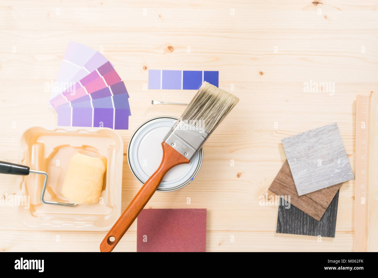 Purple paint and paint brushes for home improvement project Stock Photo ...