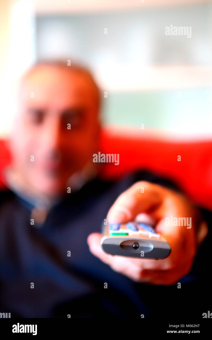 man with remote control Stock Photo - Alamy