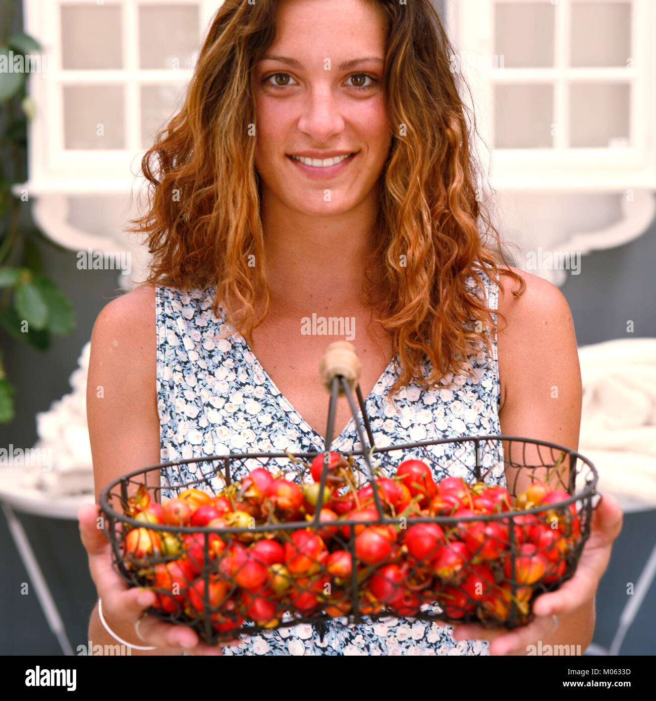woman with cherries Stock Photo - Alamy