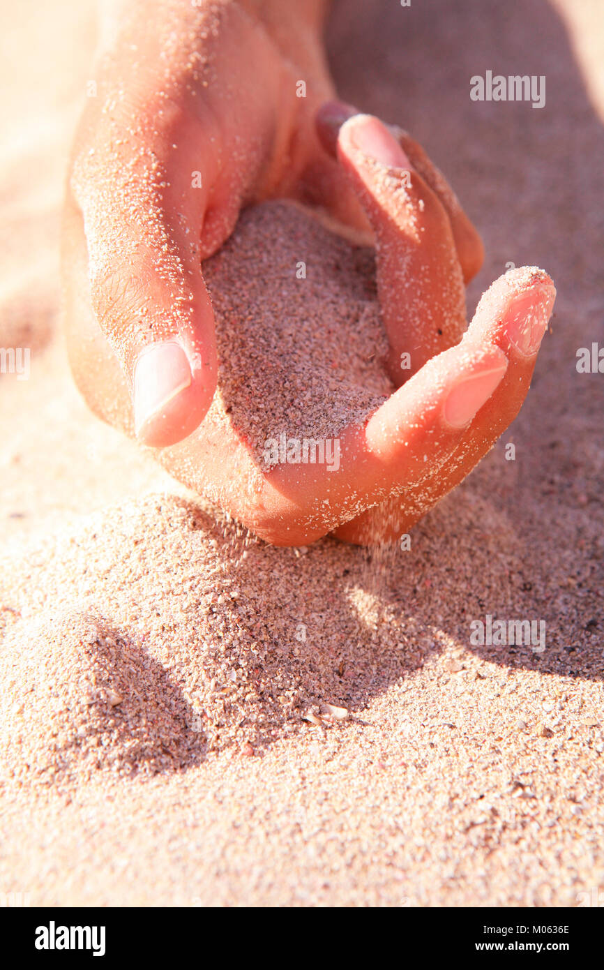 hand in the sand Stock Photo - Alamy