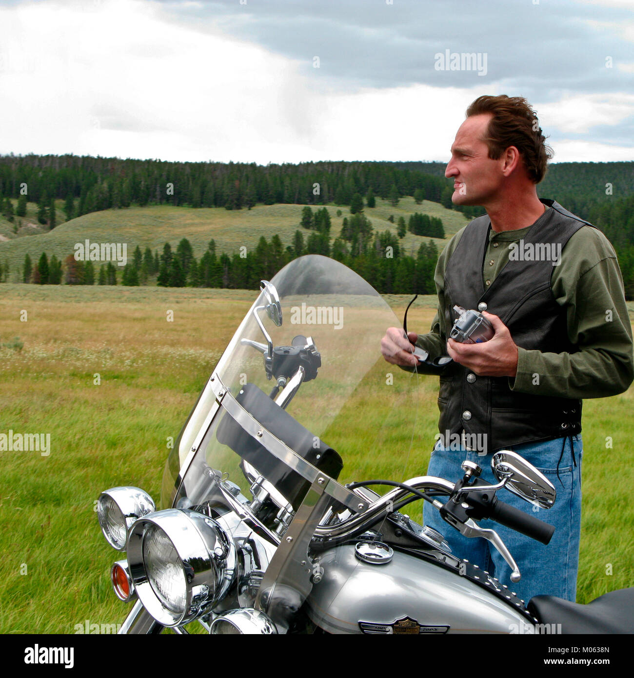 biker, yellowstone national park, wyoming, usa Stock Photo - Alamy