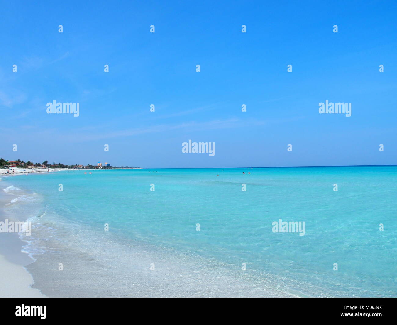 Sandy beach at Caribbean Sea in VARADERO city in CUBA with clear water ...