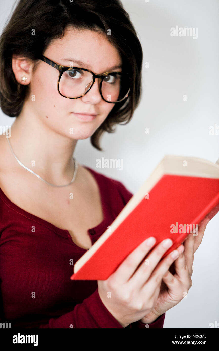 a girl with a book Stock Photo - Alamy