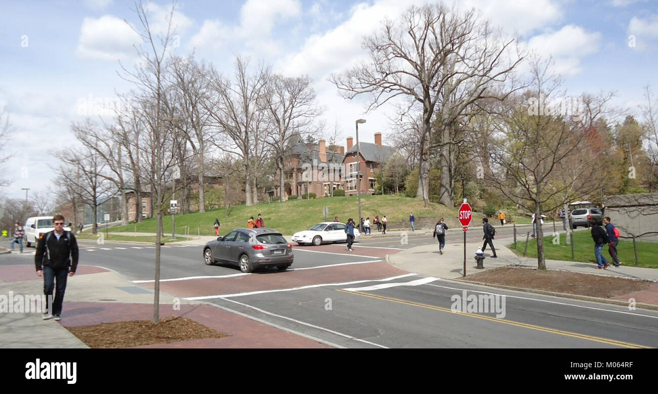 This view of the Cornell University campus showcases students walking ...