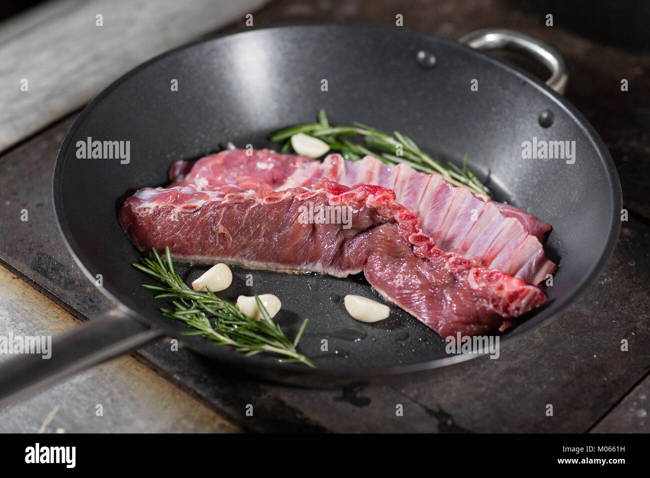 fried ribs of lamb. add a sprig of rosemary and garlic. Cooking with ...