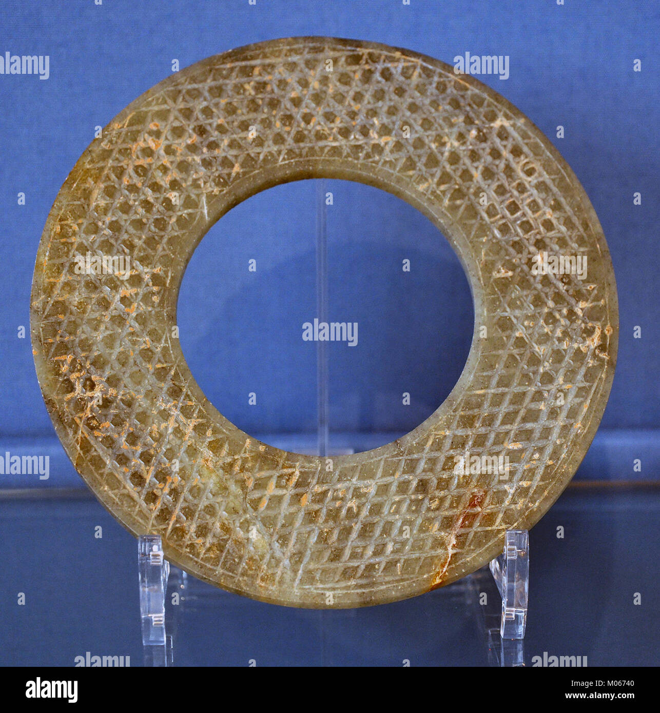 This jade disc from Brussels, dated 2011, features intricate ...