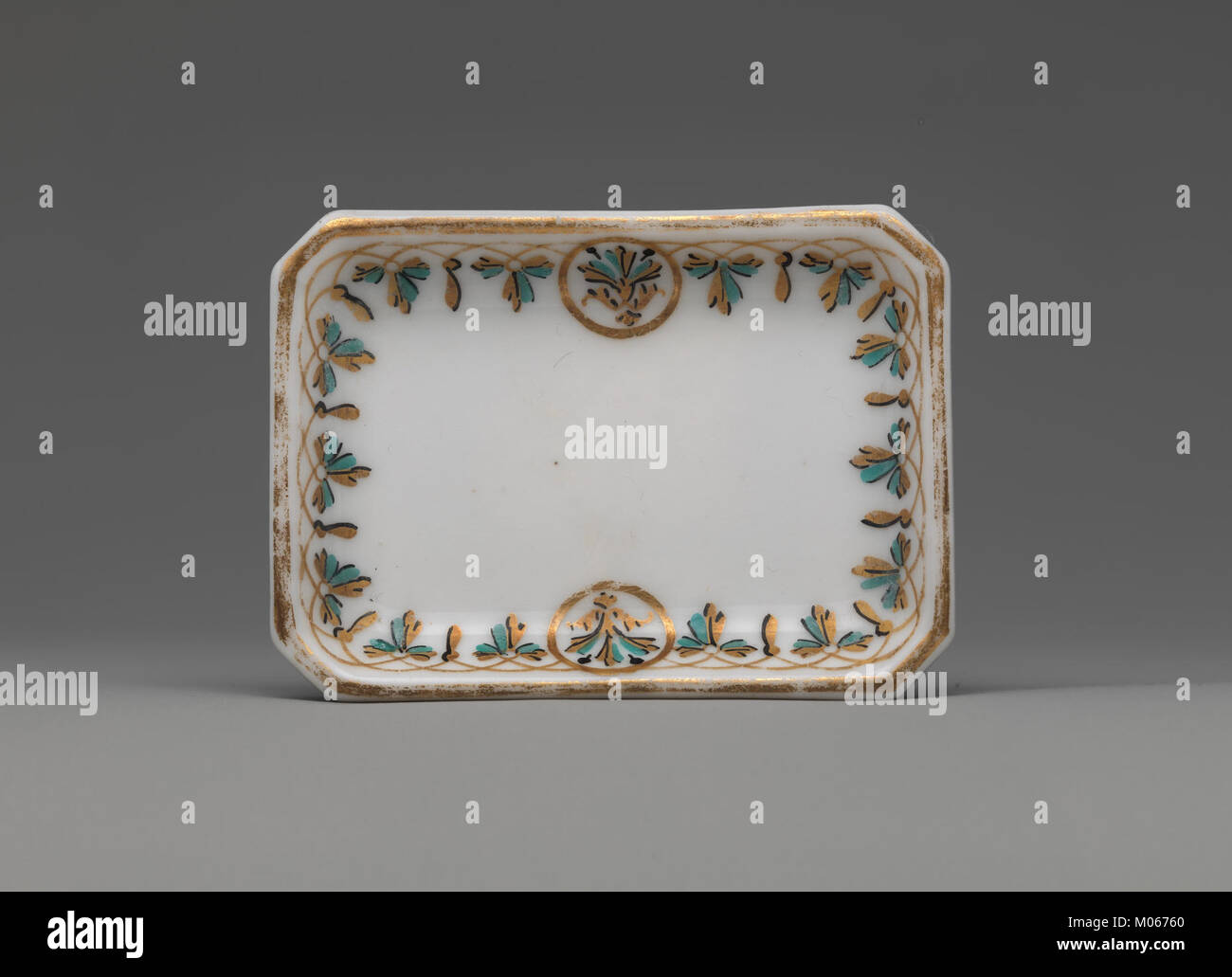 This butter pat is a small, flat dish used for serving butter, common ...