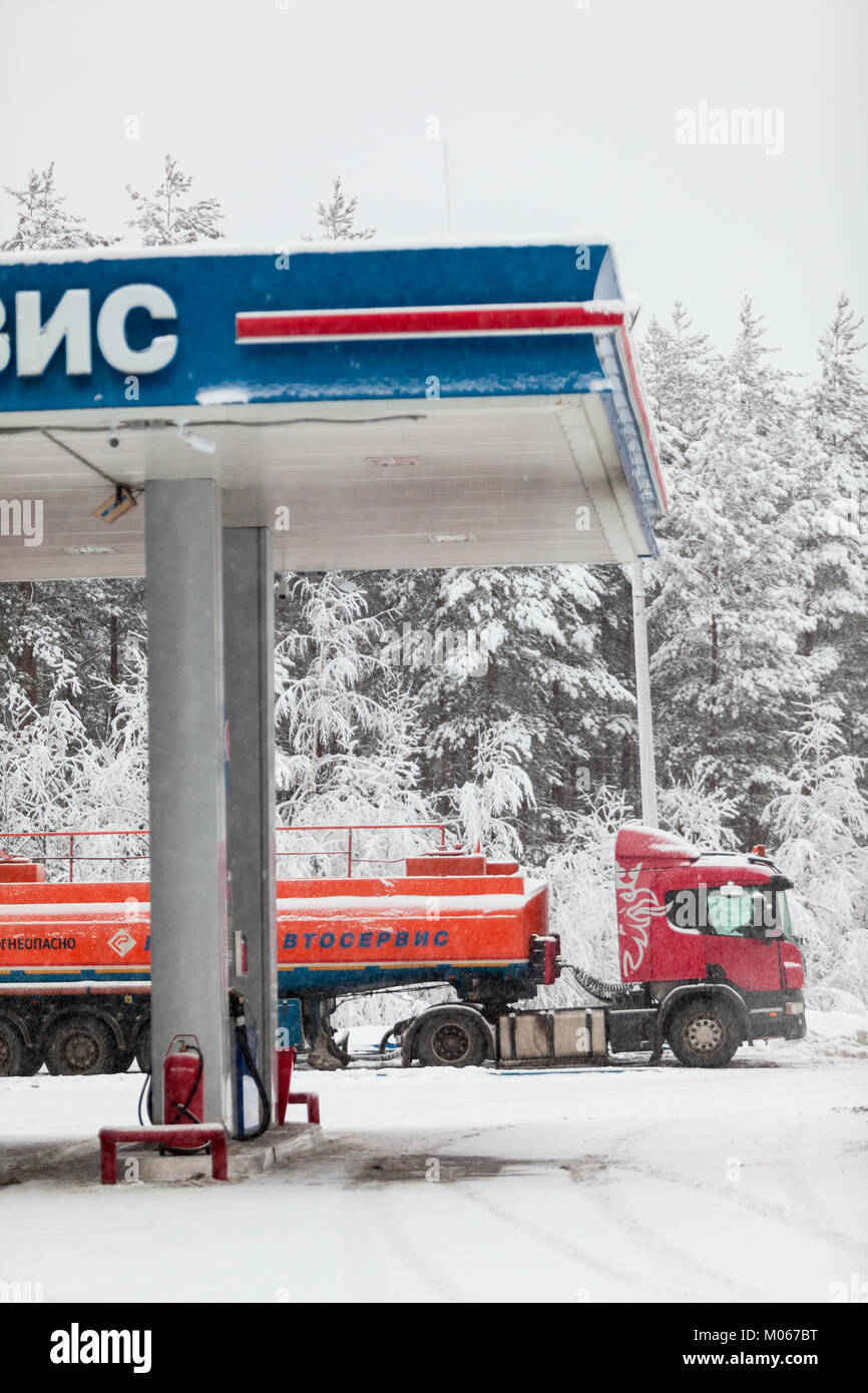 KARELIA, RUSSIA-CIRCA JAN, 2018: Gas-tank truck stands at fuel draining ...
