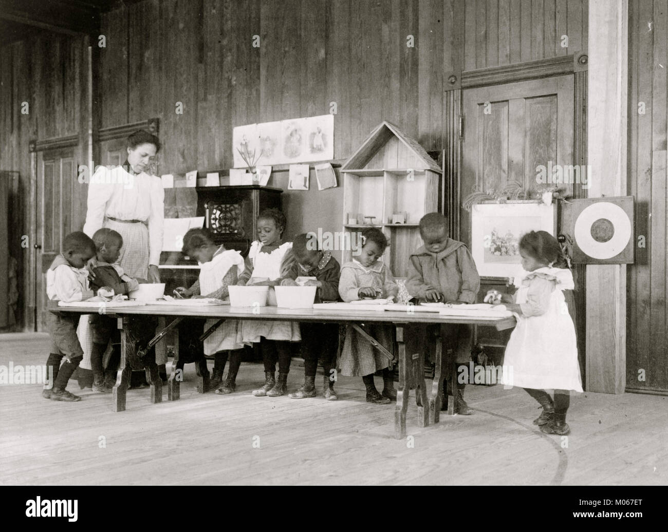 Children, in kindergarten, learning washing and ironing Stock Photo - Alamy