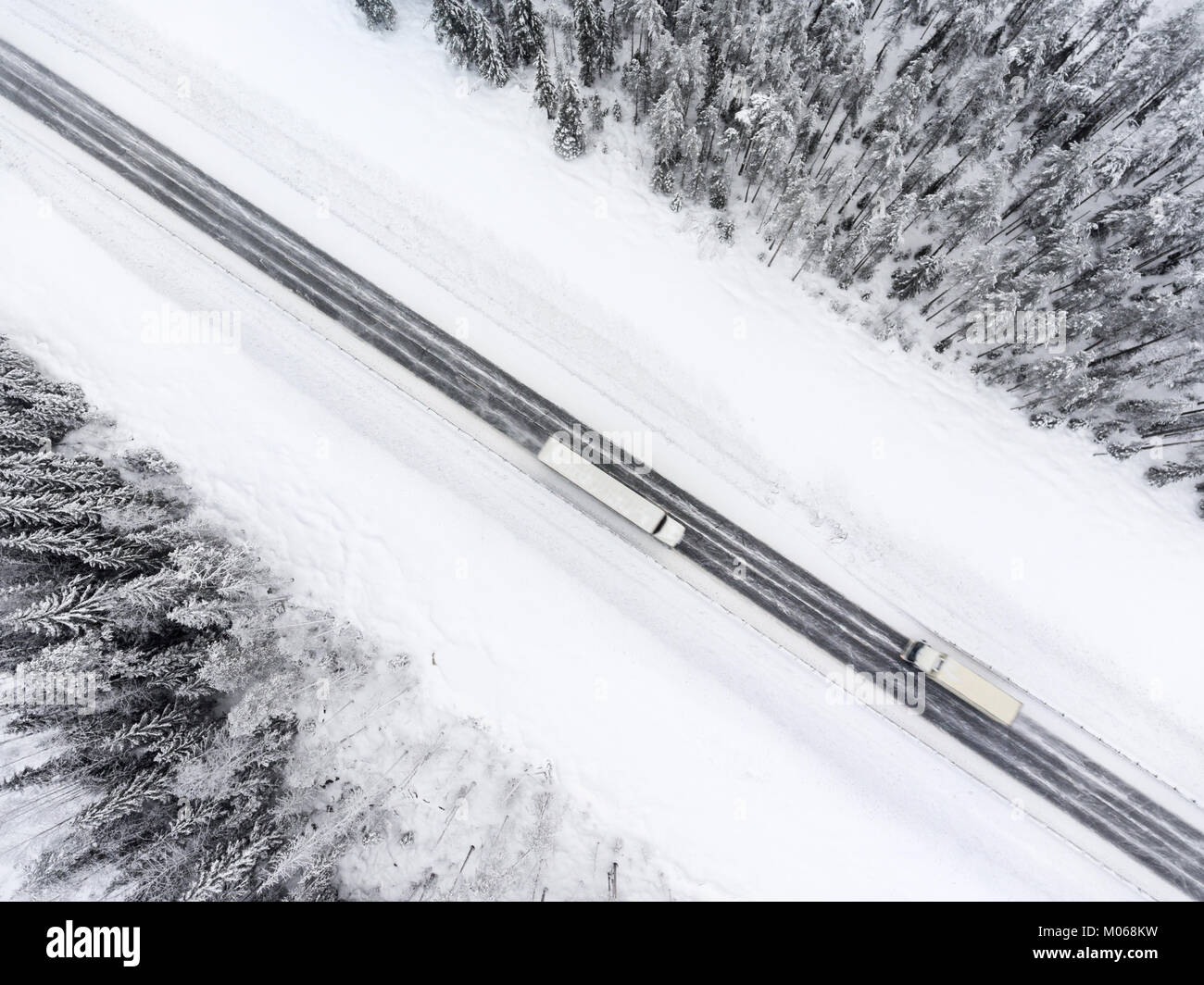 Semitrailer truck and lorry driving from the opposite direction on a ...