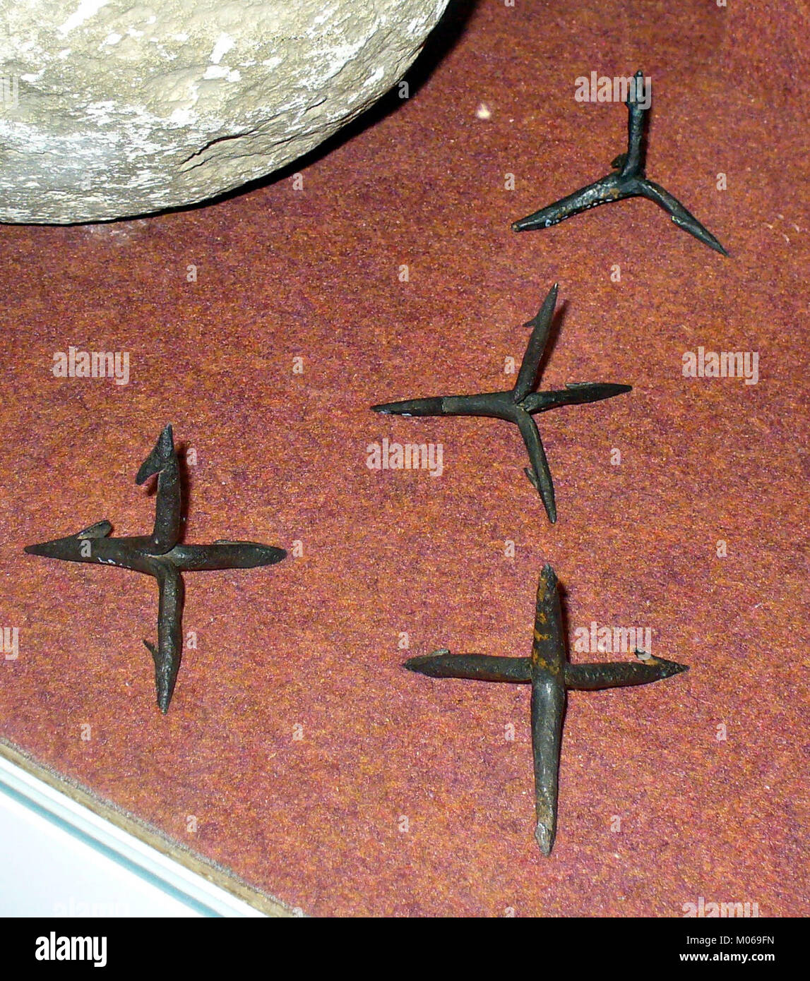 A caltrop, a spiked device used in warfare to injure enemy soldiers or ...