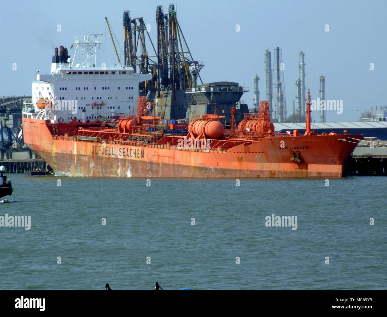 This photograph captures a Bow Lancer, a ship at Botlek Harbour in the ...