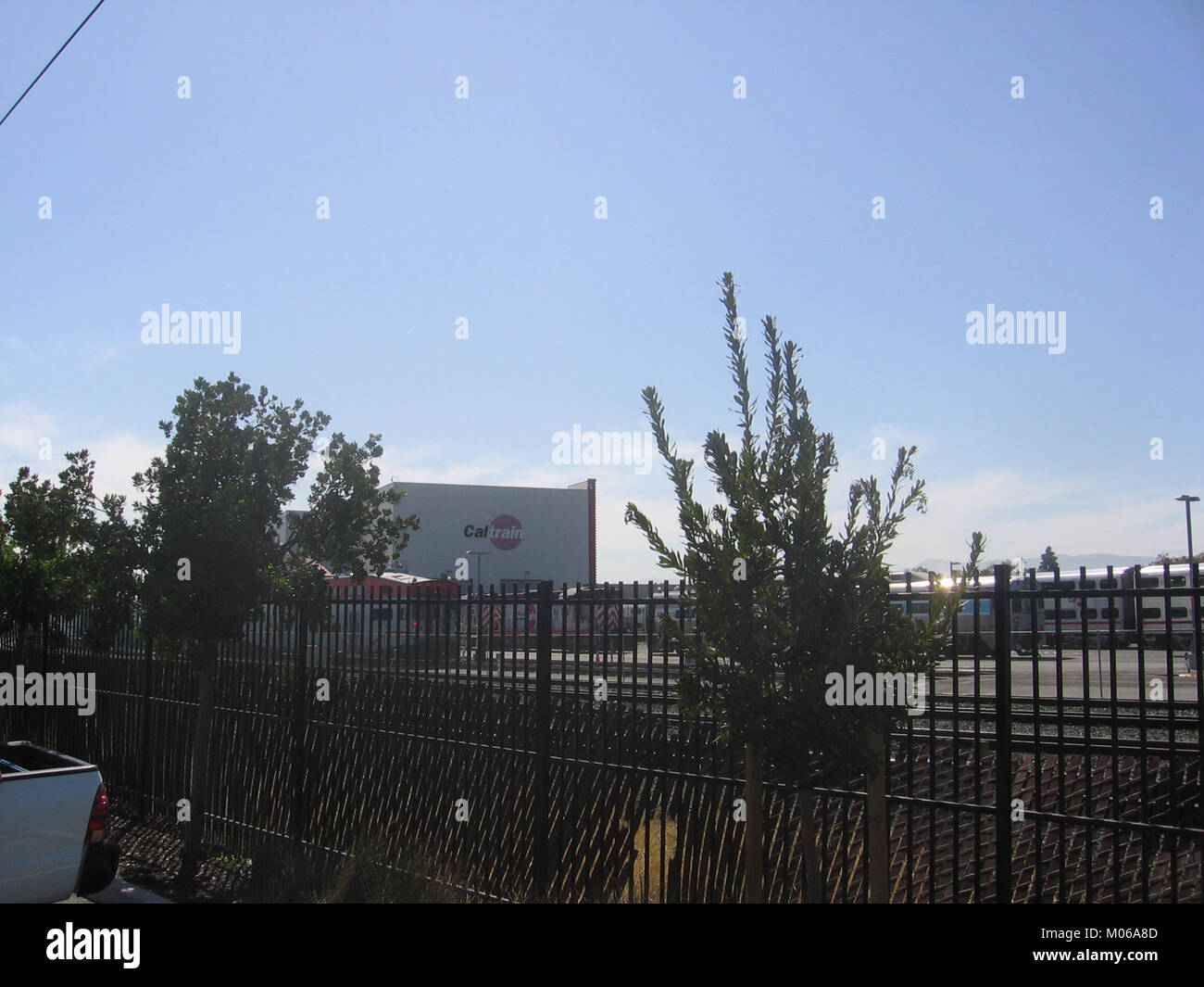 This image features a Caltrain locomotive, specifically CEMOF 1373 ...