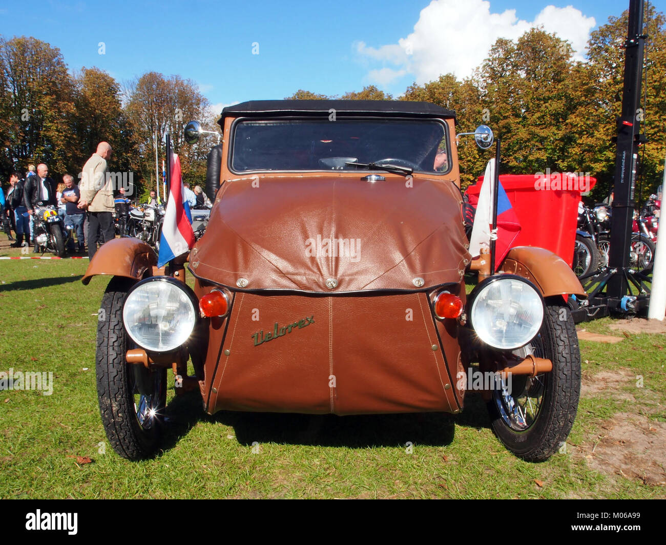 This image represents a brown Velorex, a distinctive car model known ...