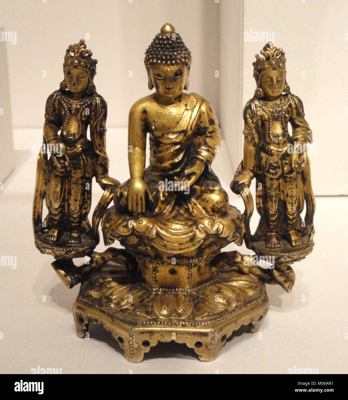 Buddhist Triad - Seated Buddha Shakyamuni Flanked by Two Standing ...