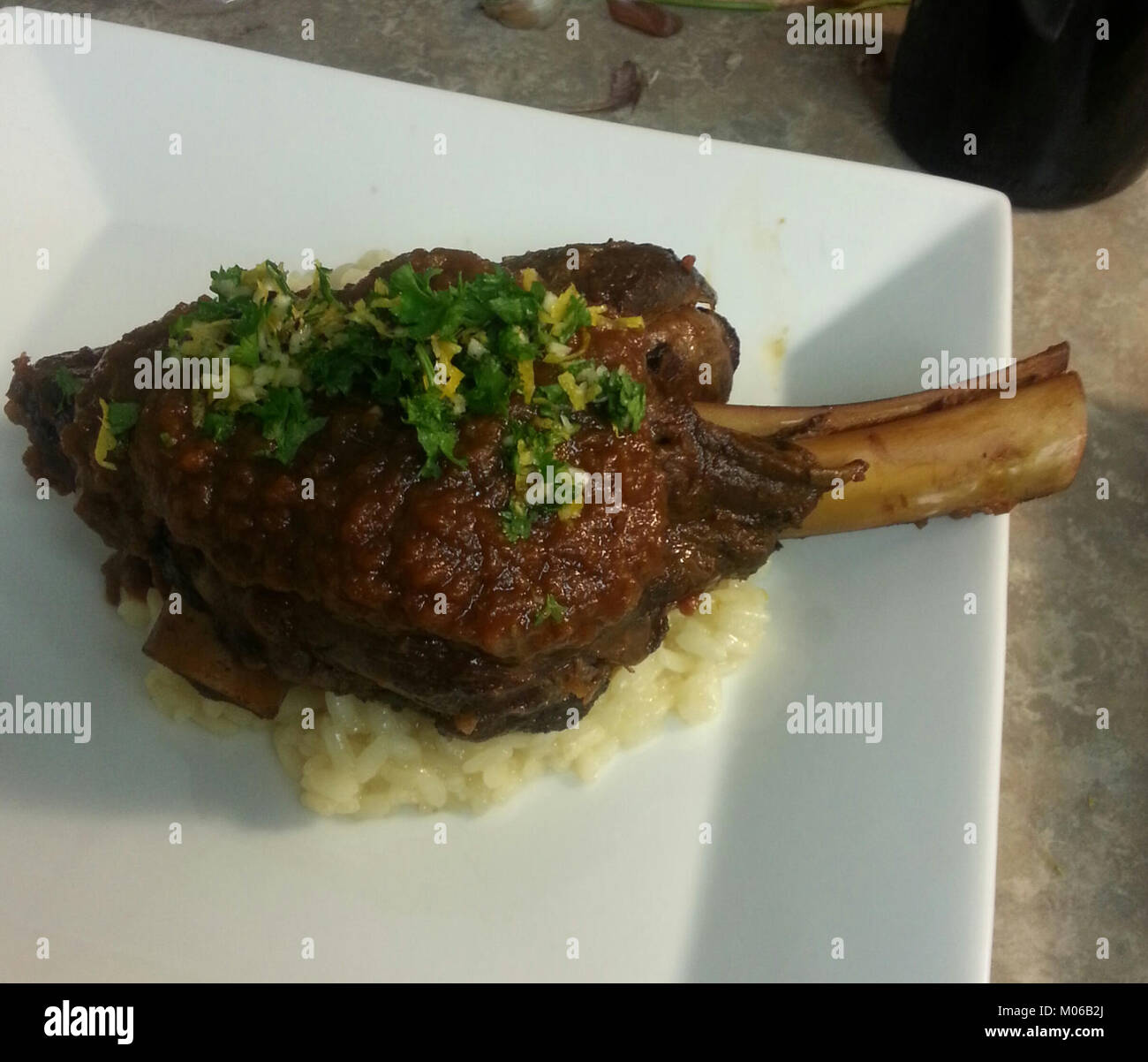 Braised lamb shanks hi-res stock photography and images - Alamy