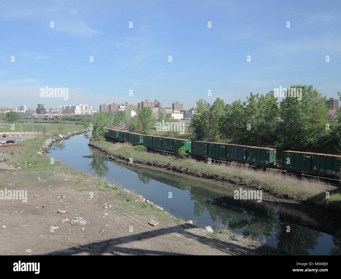 This photograph captures a scenic view of the Bronx Kill area, with the ...