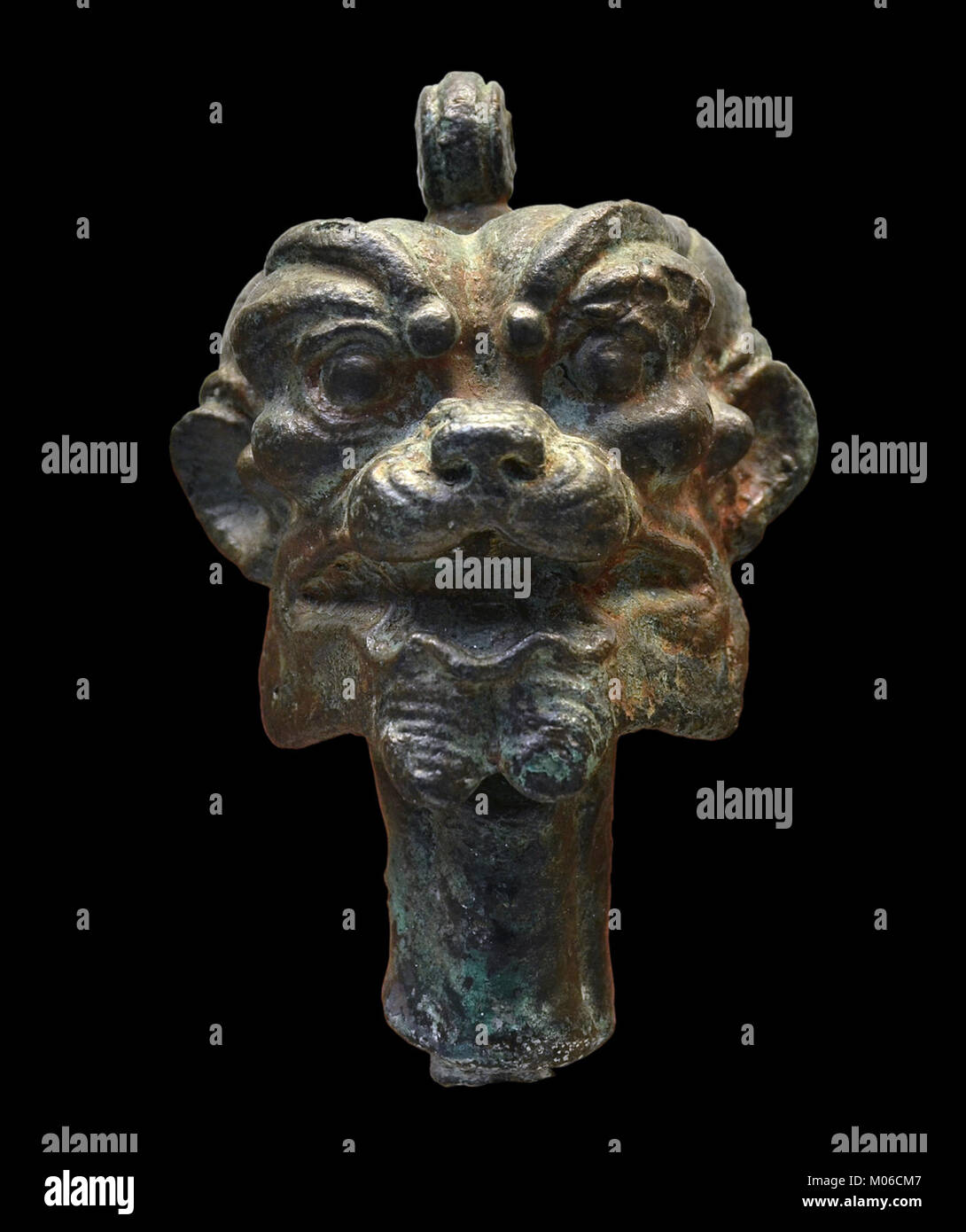 This bronze head of Pazuzu, an ancient Mesopotamian demon, was ...