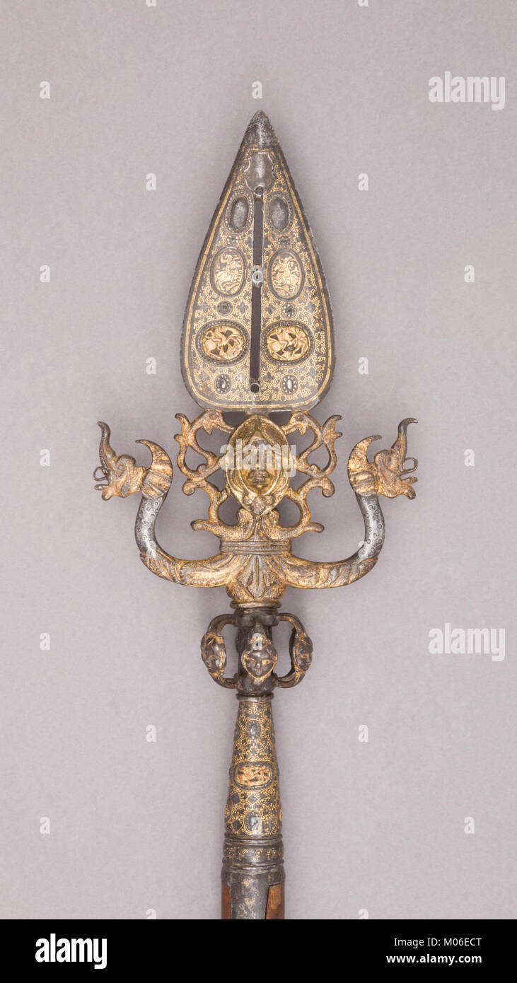 This linstock, a device used in early gunpowder weaponry, reflects the ...
