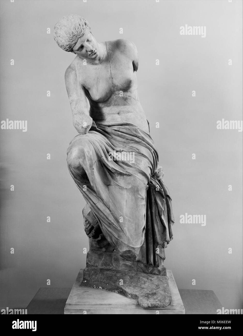 This marble statue represents a seated muse, an iconic figure from ...