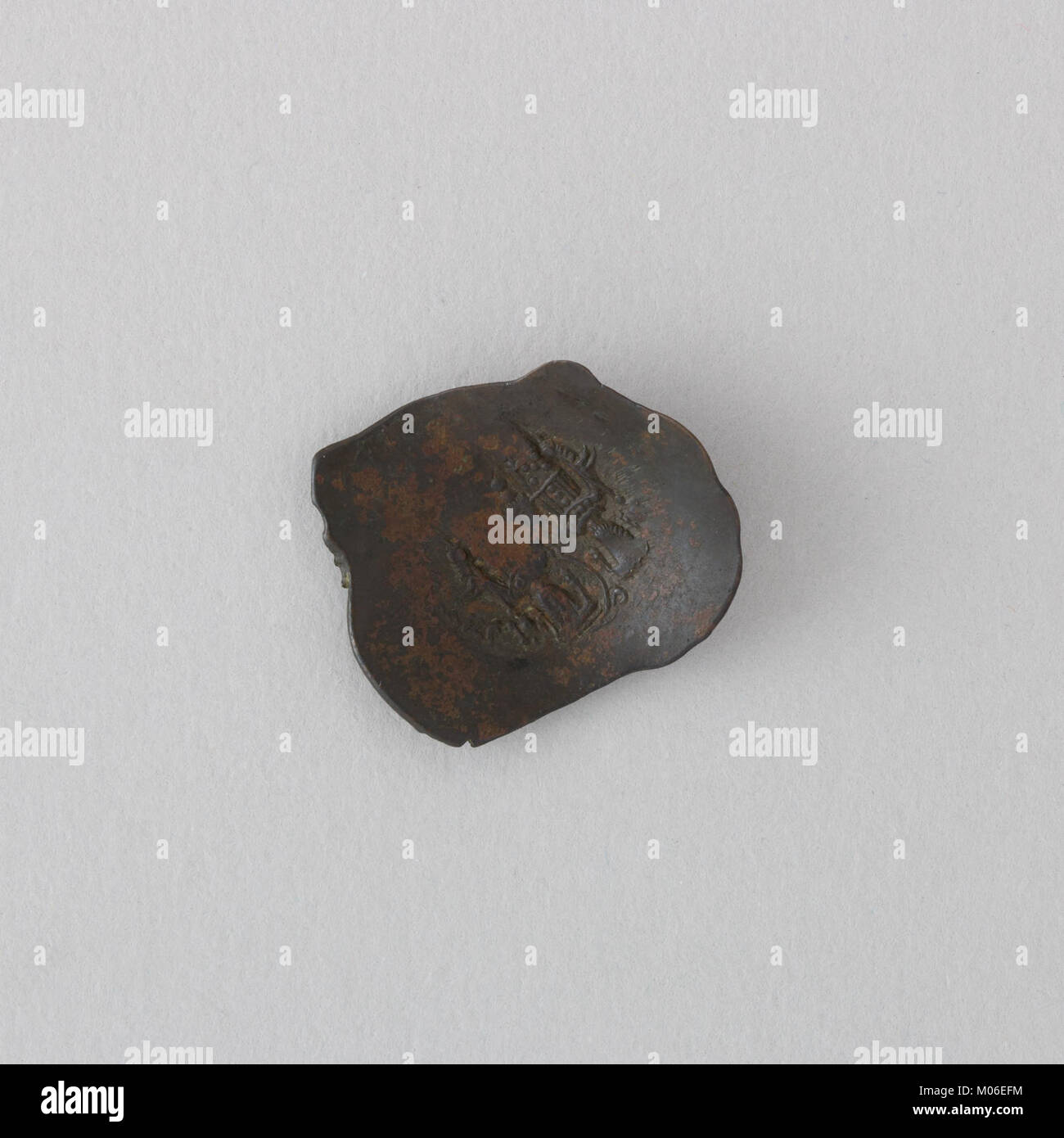 This coin, a Nomisma of Alexius III, dates back to the Byzantine Empire ...
