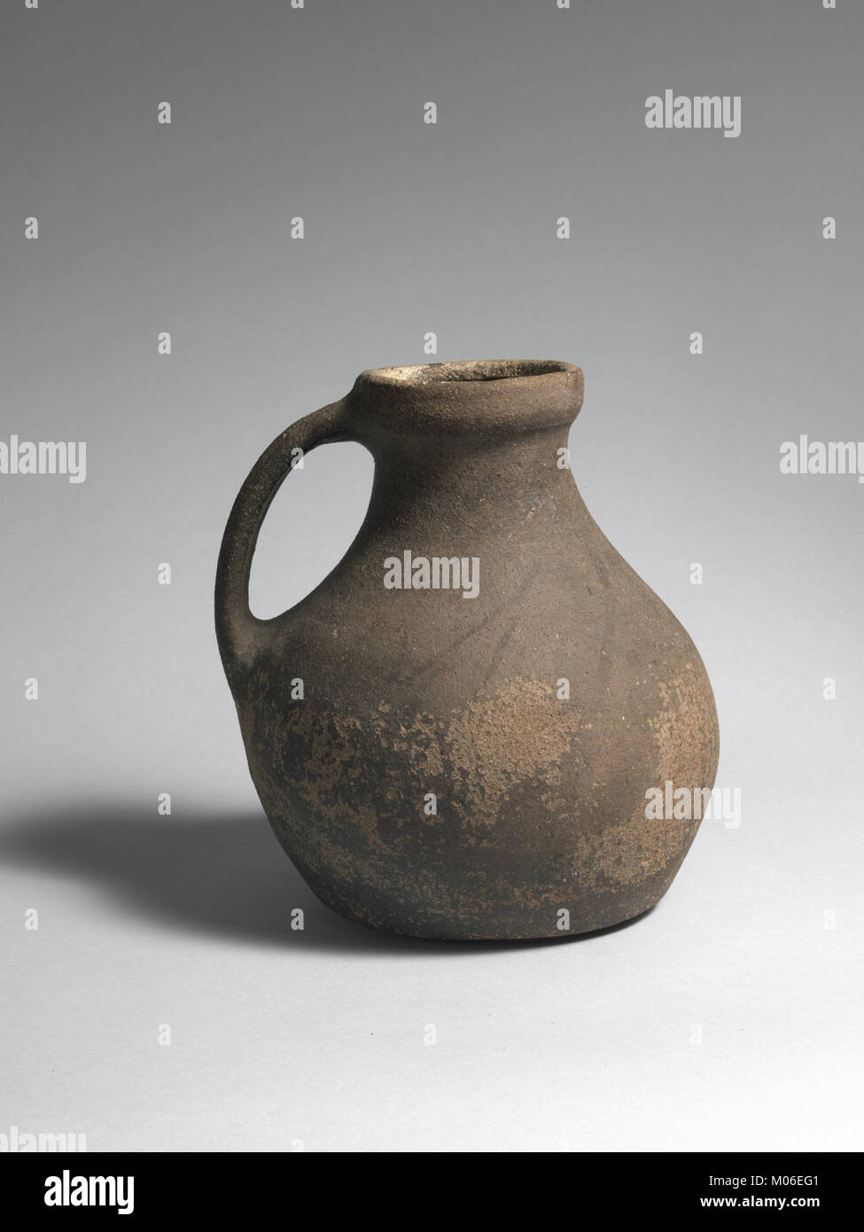 This jug, a typical example of period ceramic craftsmanship, was ...