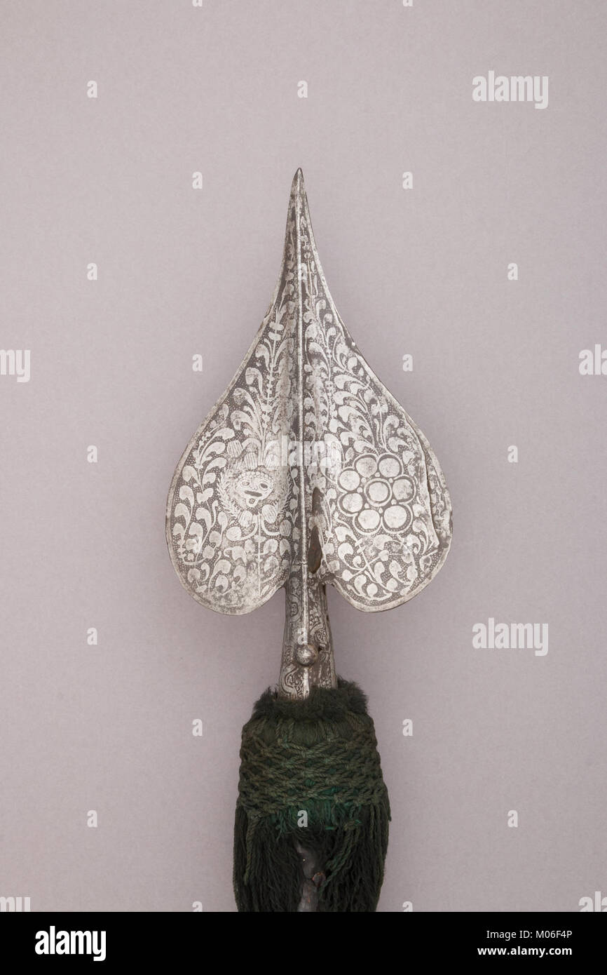 A lance, featuring a long shaft and pointed tip, designed for use in ...