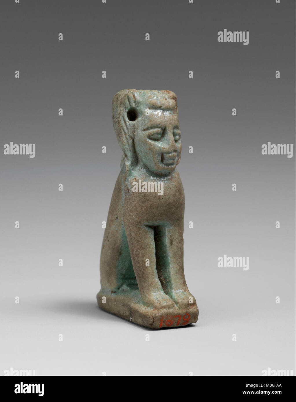 This sculpture of a human-headed cat blends anthropomorphic and animal ...