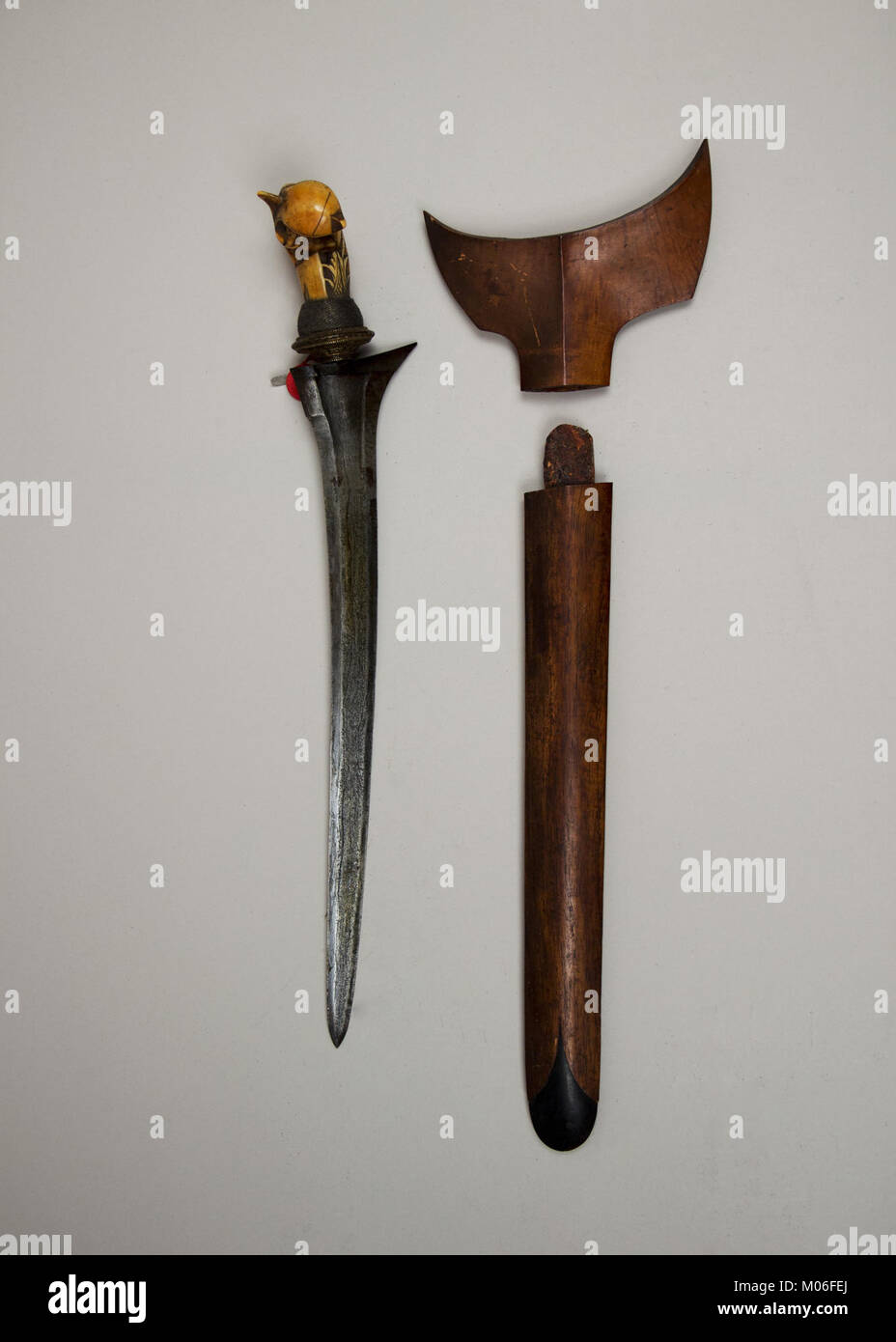 This Kris dagger, complete with its sheath, is a traditional Southeast ...