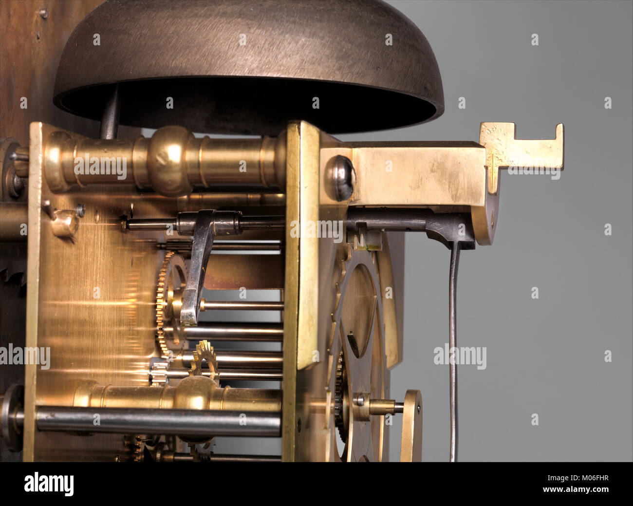 This longcase clock features an integrated calendar, displaying the ...