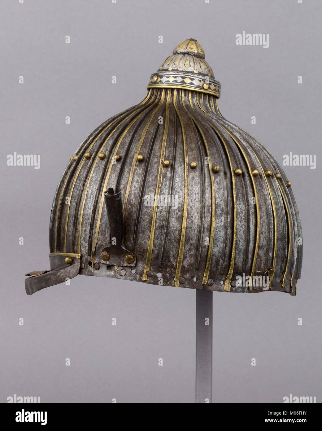 This multi-plate helmet demonstrates advanced medieval armor, balancing ...