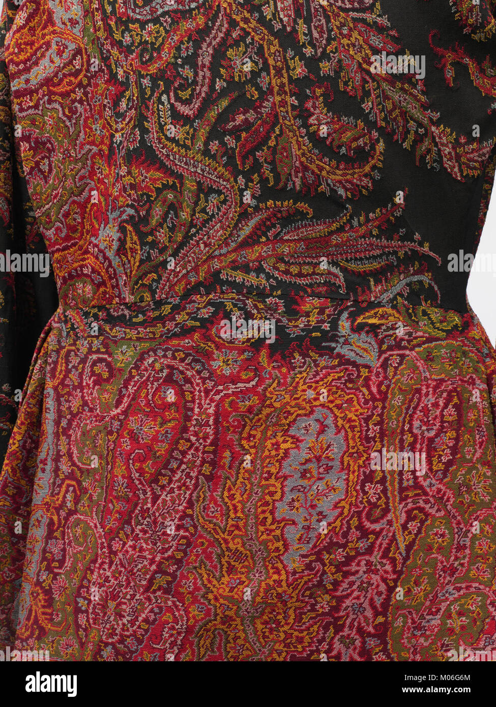 This jacket, a fine example of textile craftsmanship, features ...