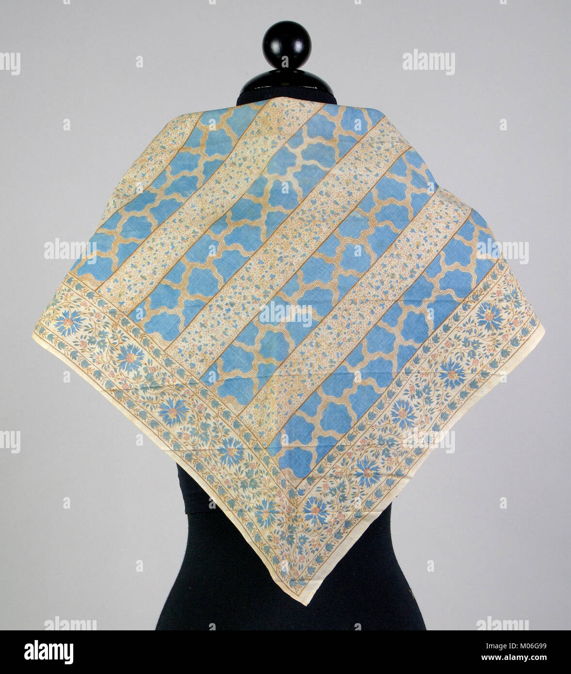 This kerchief, made from fine material, served as both a functional and ...